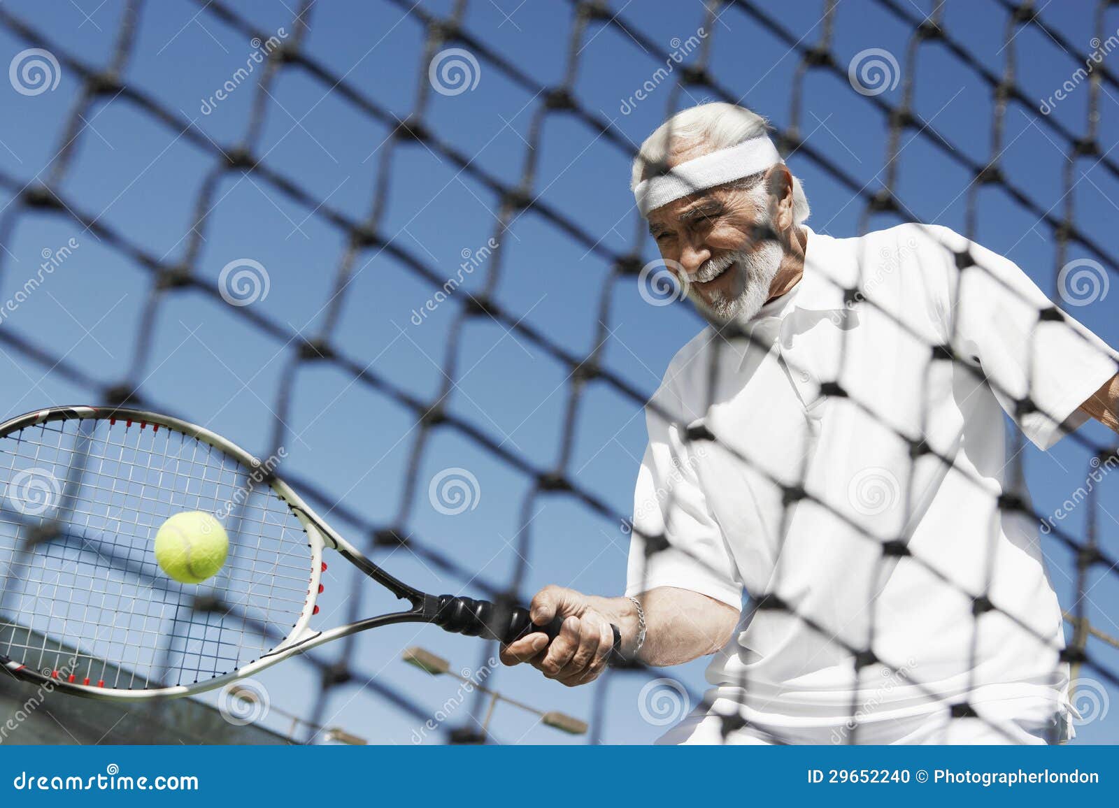 Senior Man Playing Tennis stock photo. Image of ethnicity - 29652240