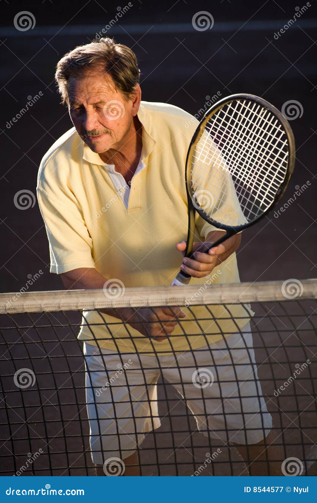 Senior man playing tennis stock image. Image of fitness - 8544577
