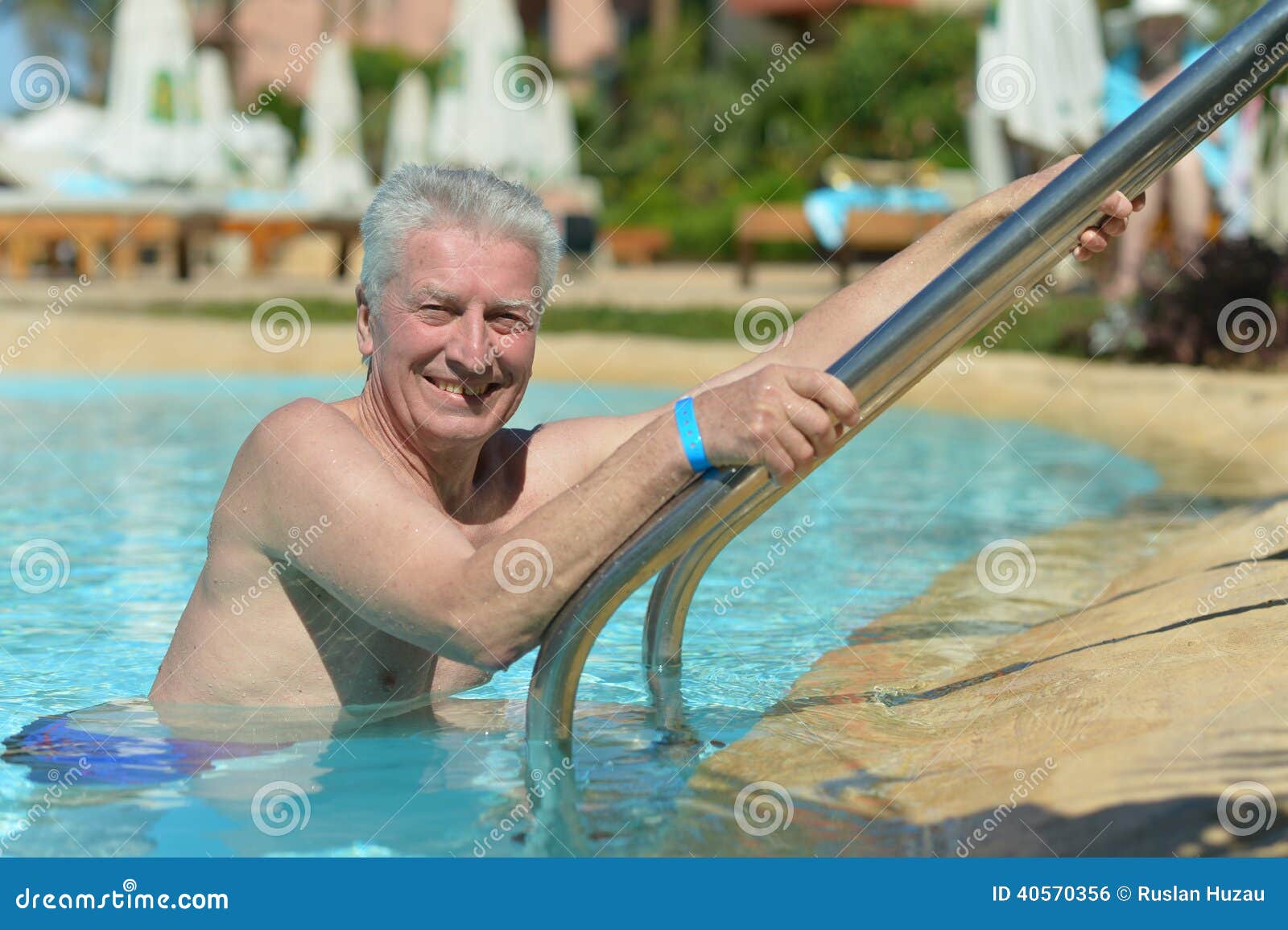Senior man in pool stock photo. Image of older, senior - 40570356