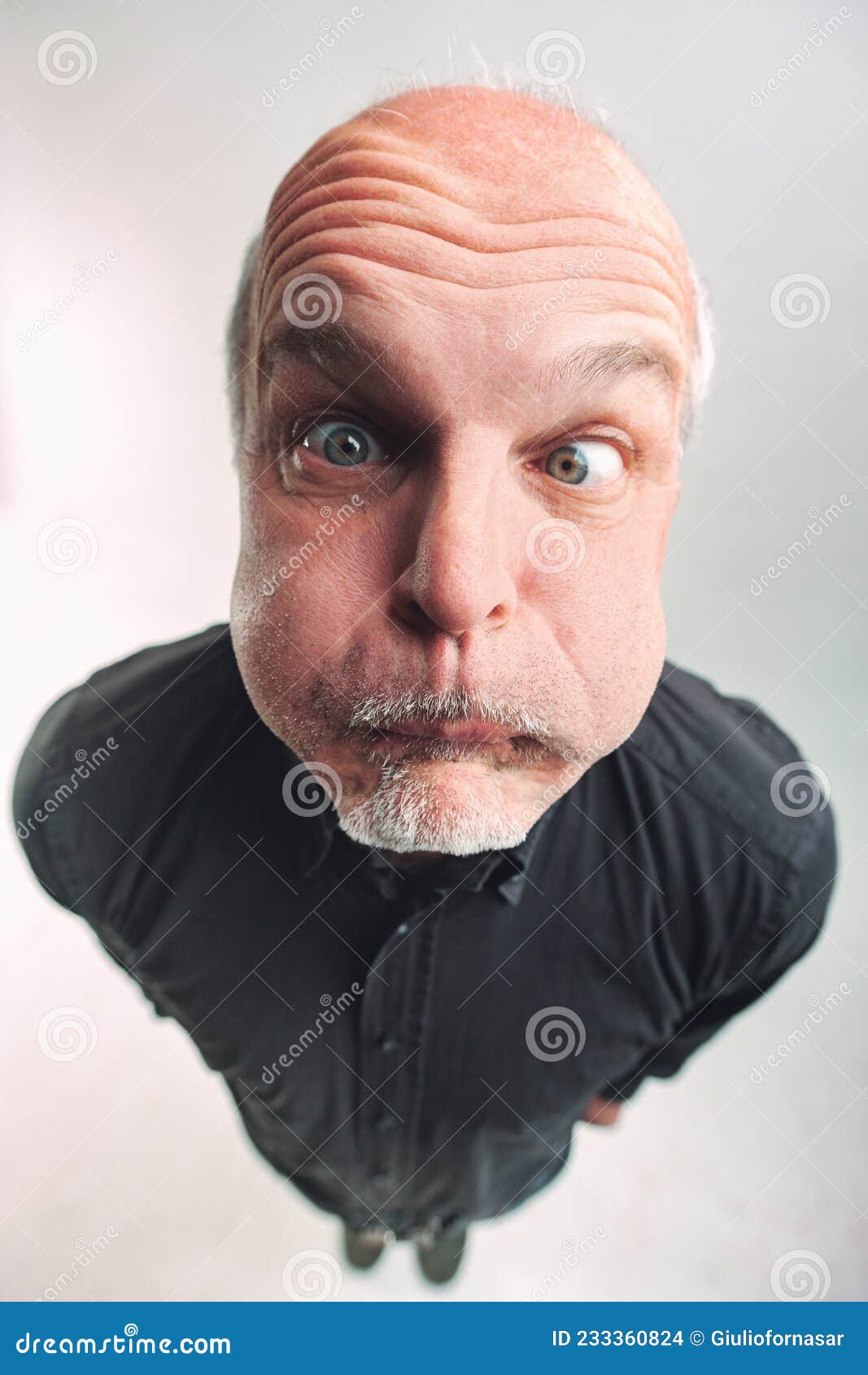 Senior Man Pulling a Funny Face in a Top Down View Stock Photo - Image ...