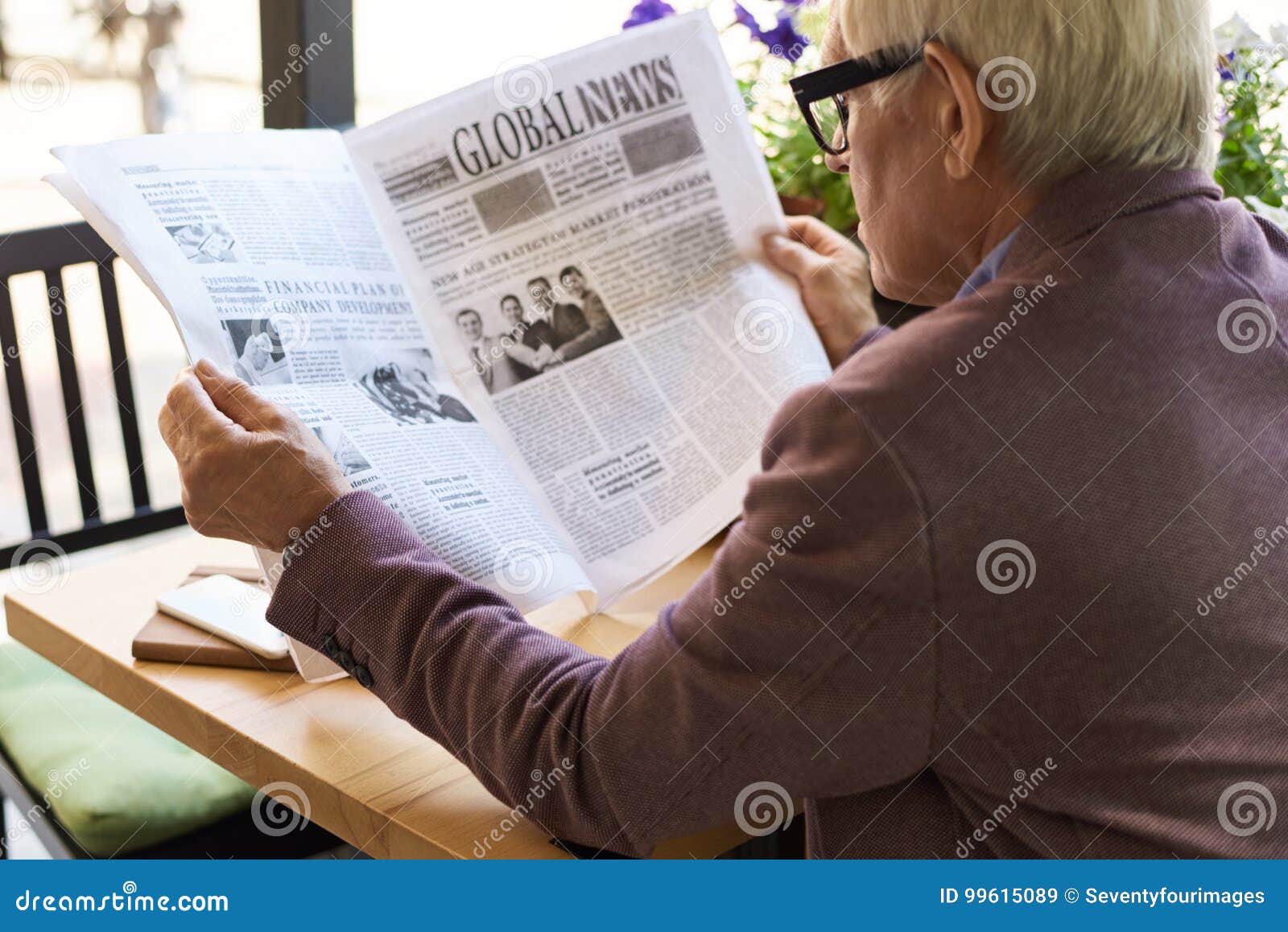 Senior Man Reading Newspaper at Breakfast Stock Image - Image of ...