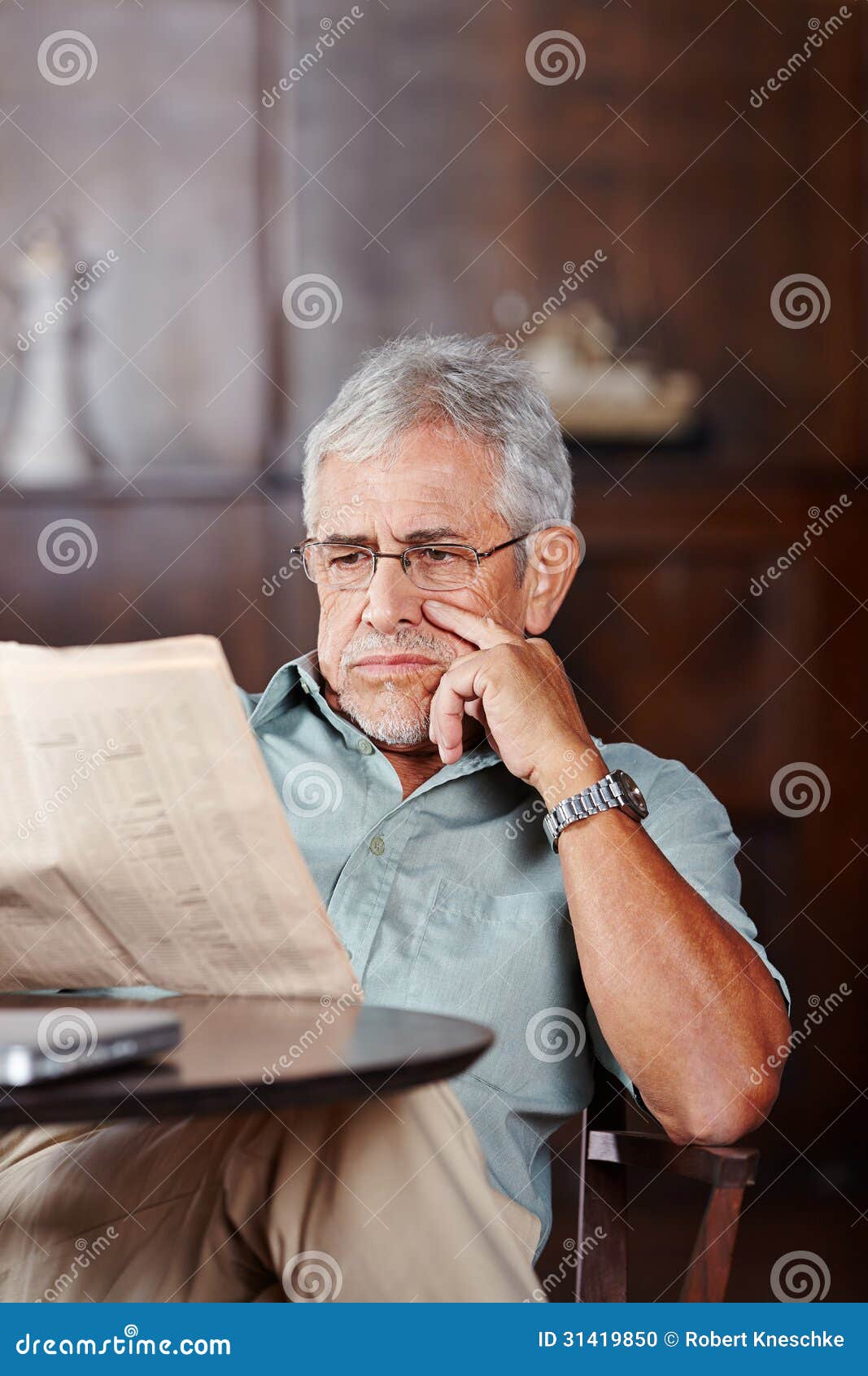 Senior Man Reading Newspaper in Retirement Home Stock Photo - Image of ...