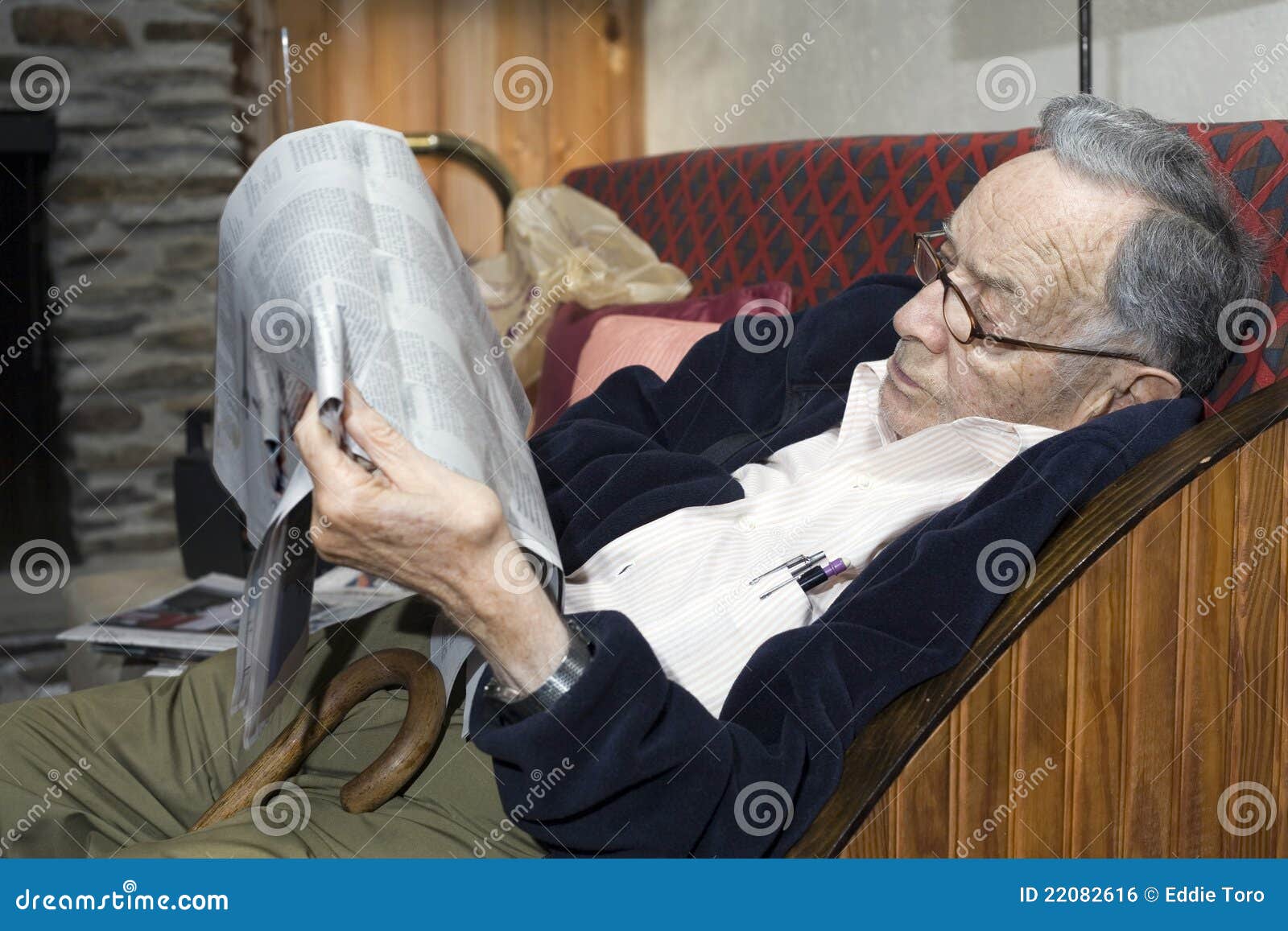 Senior man reading paper stock photo. Image of resting - 22082616