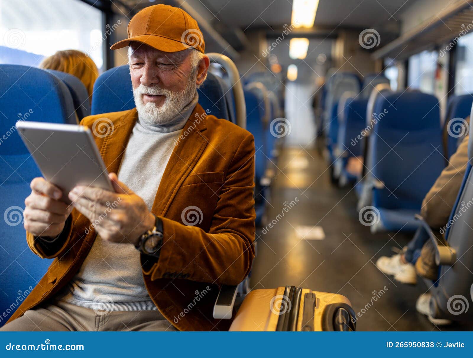 Senior Man Reading on Tablet in Train Stock Photo - Image of enjoying ...