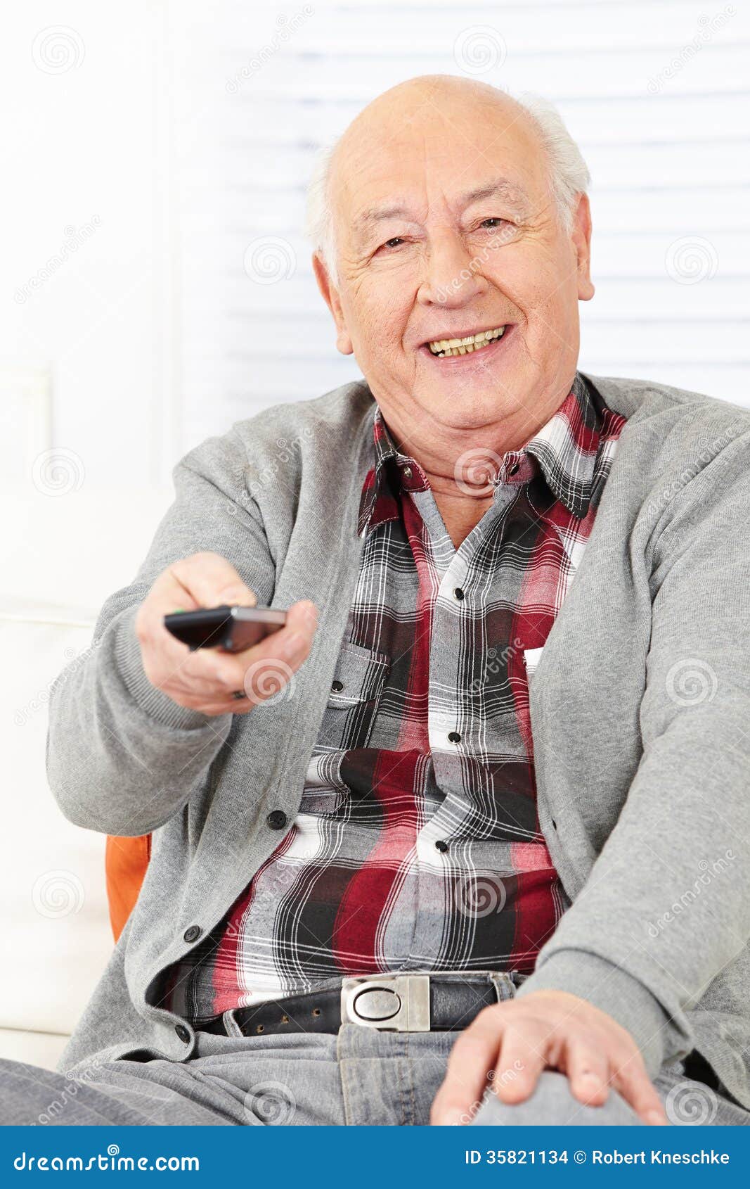 Senior Man with Remote Control Stock Photo - Image of control, retiree ...
