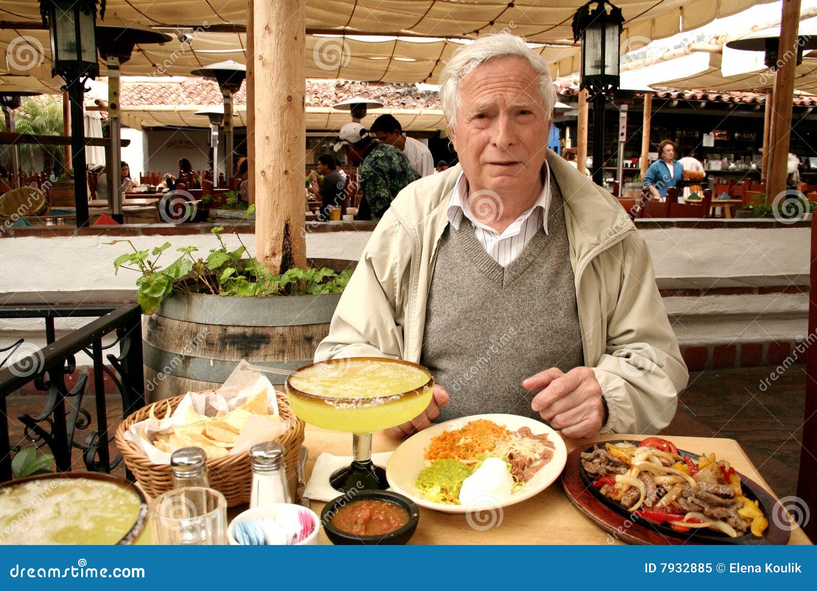 Senior man at restaurant stock image. Image of sitting - 7932885