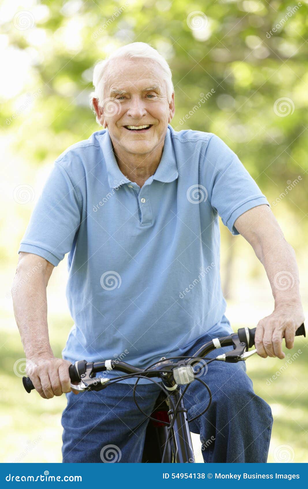 Senior man riding bike stock photo. Image of camera, elderly - 54954138