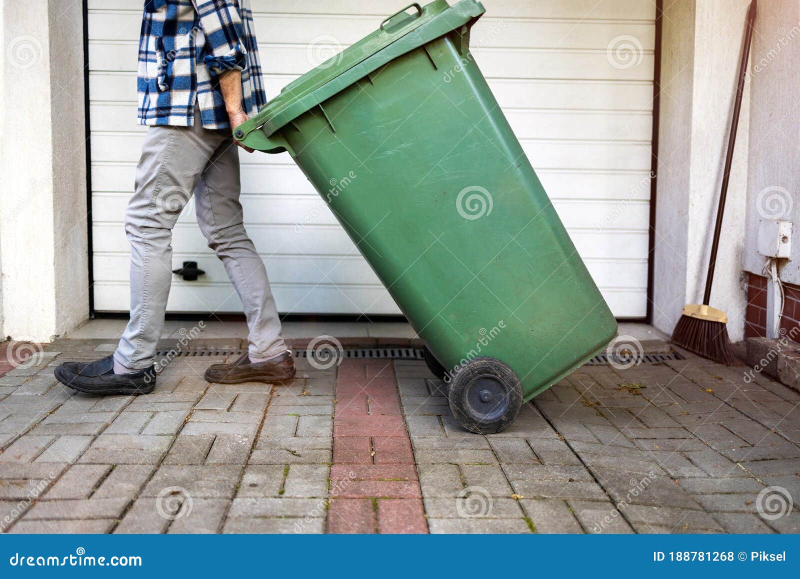 Senior Man Rolling Garbage Can Stock Photo - Image of collection, cann ...