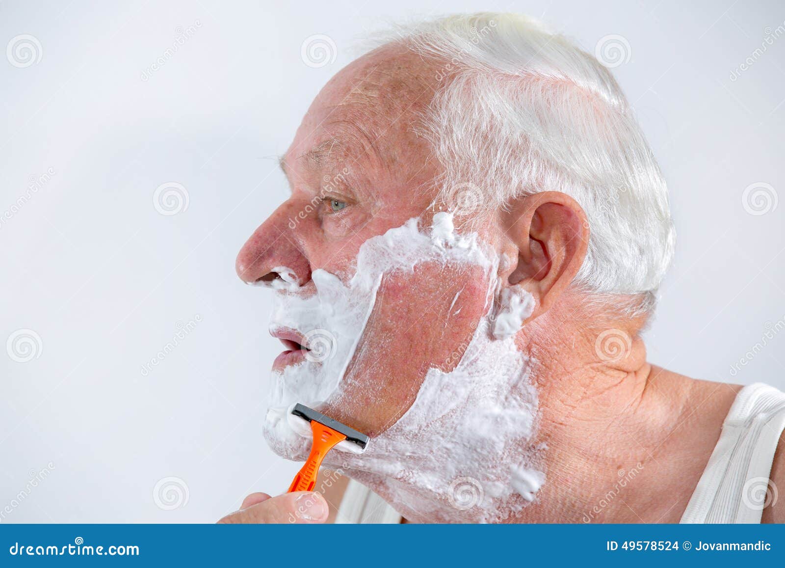 Senior Man Shaving His Beard Stock Photo - Image of male, closeup: 49578524
