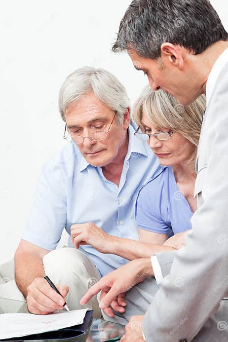Senior Man Signing Contract Stock Photo - Image of completion, merchant ...
