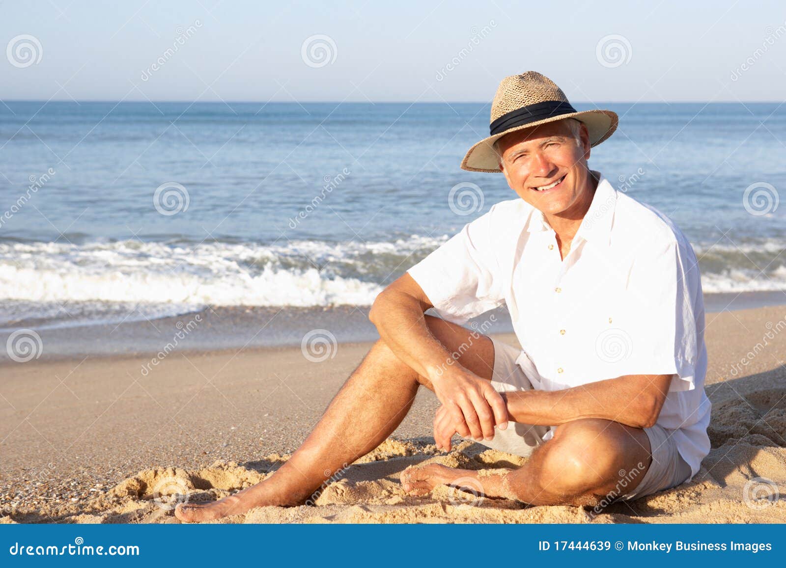 Senior Man Sitting on Beach Relaxing Stock Image - Image of camera ...