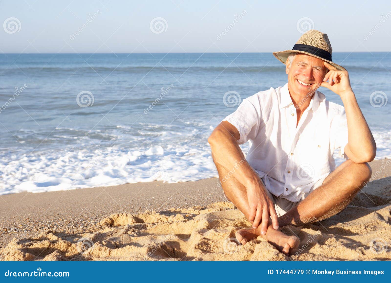 Senior Man Sitting on Beach Relaxing Stock Image - Image of camera ...