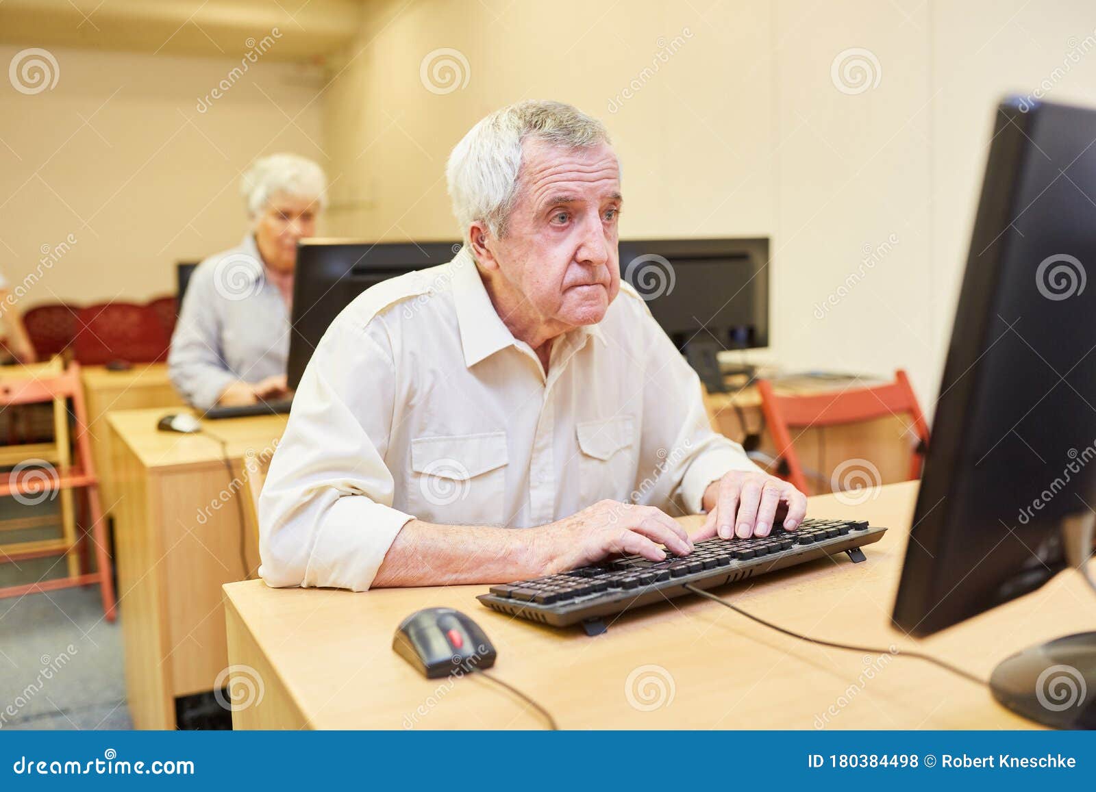 Senior Man Sitting on PC in a Computer Course Stock Photo - Image of ...