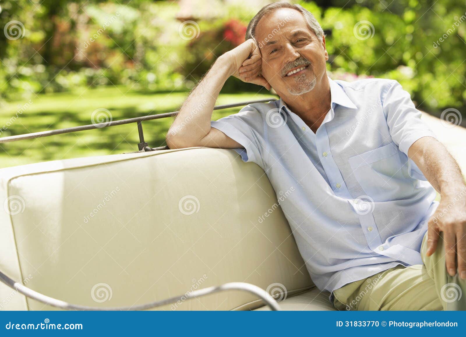 Senior Man Sitting on Sofa in Backyard Stock Photo - Image of sitting ...