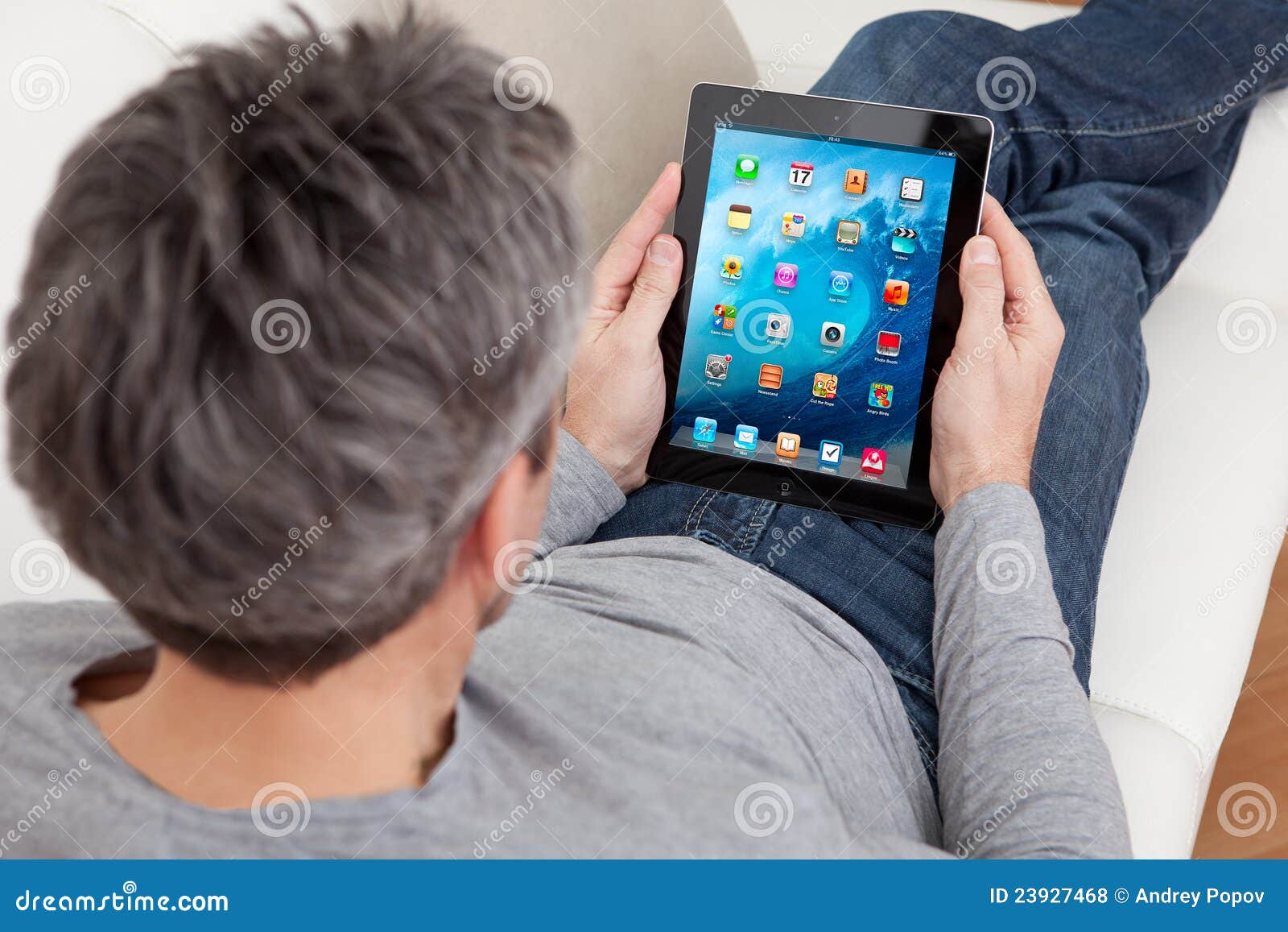 Senior Man Sitting in Sofa and Using IPad Editorial Stock Photo - Image ...