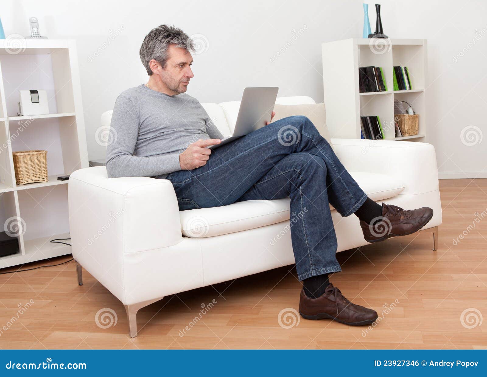 Senior Man Sitting in Sofa and Using Laptop Stock Photo - Image of ...