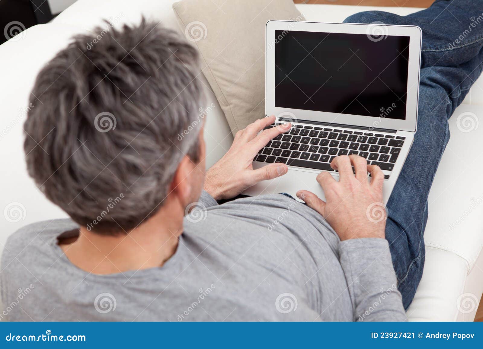 Senior Man Sitting in Sofa and Using Laptop Stock Image - Image of ...