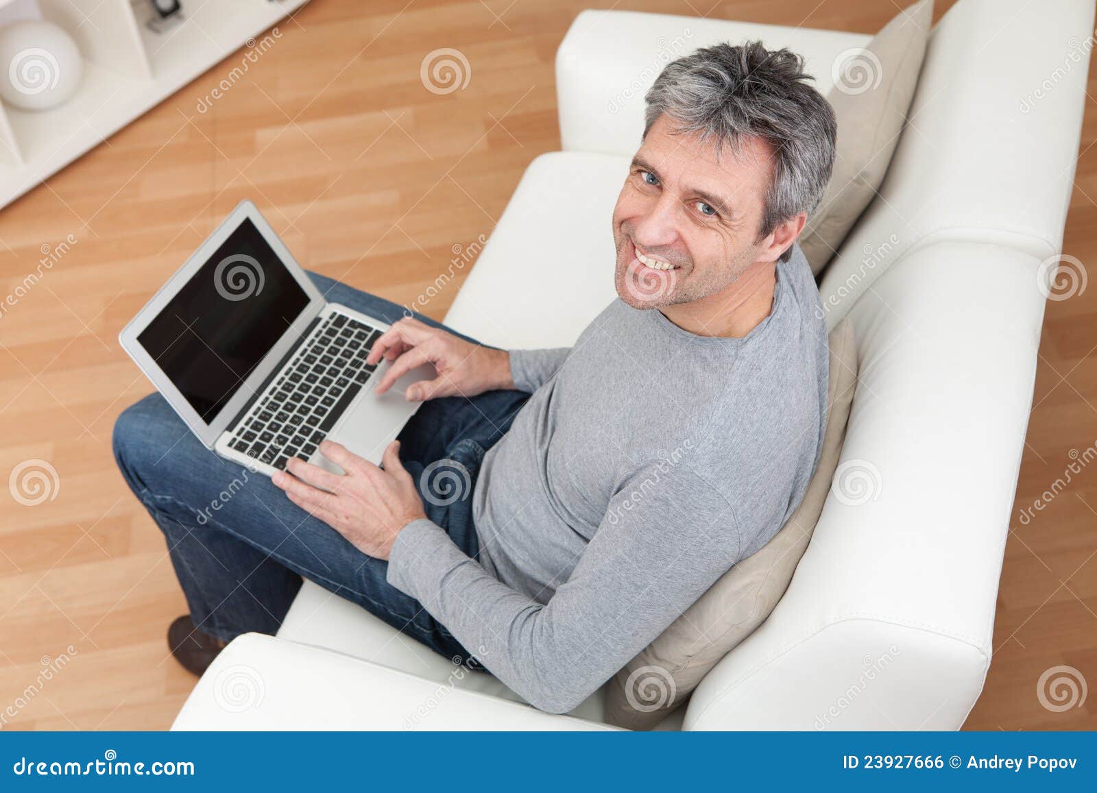 Senior Man Sitting in Sofa and Using Laptop Stock Photo - Image of ...