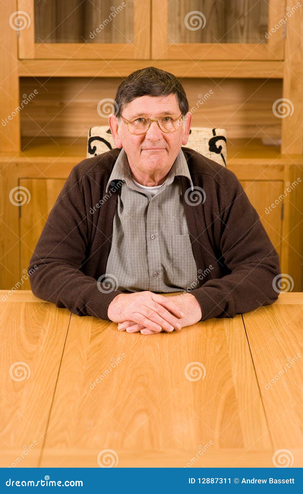 Senior Man Sitting at Table with Copyspace Below Stock Image - Image of ...