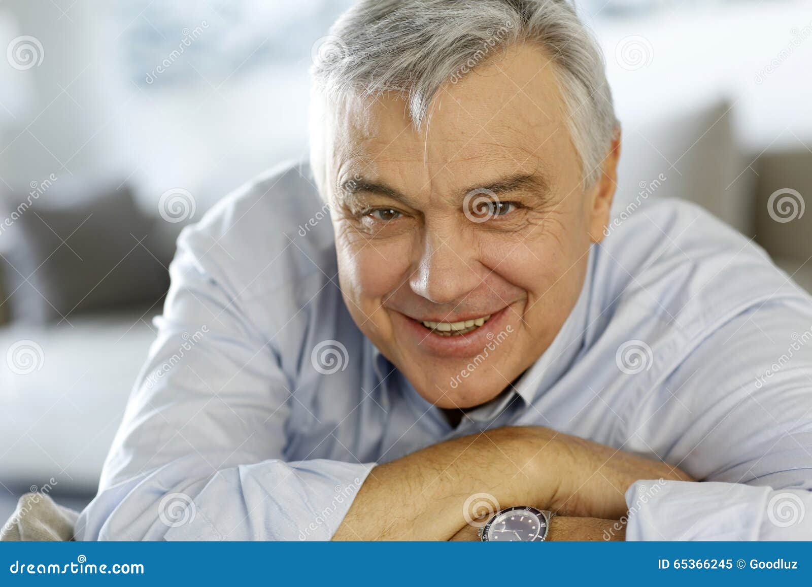 Senior Man Smiling on Couch Stock Image - Image of sofa, retirement ...