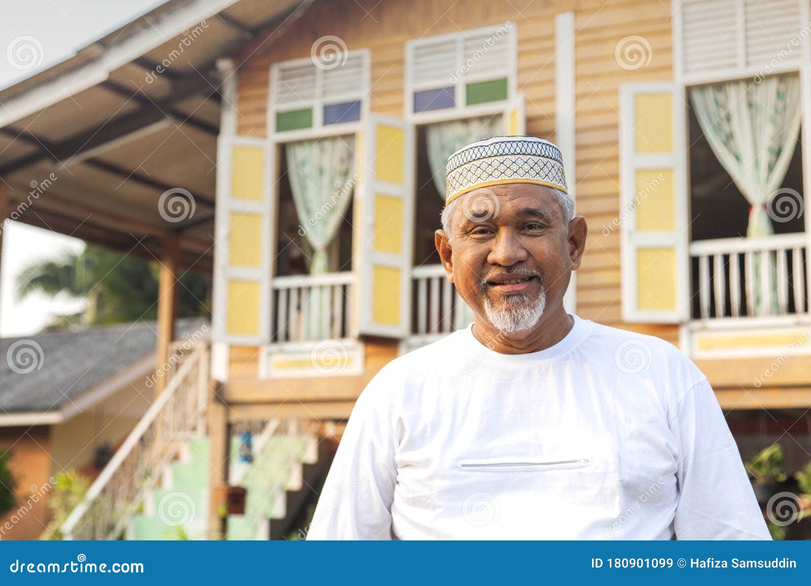 Senior Man Standing in Front of Wooden House Stock Image - Image of ...