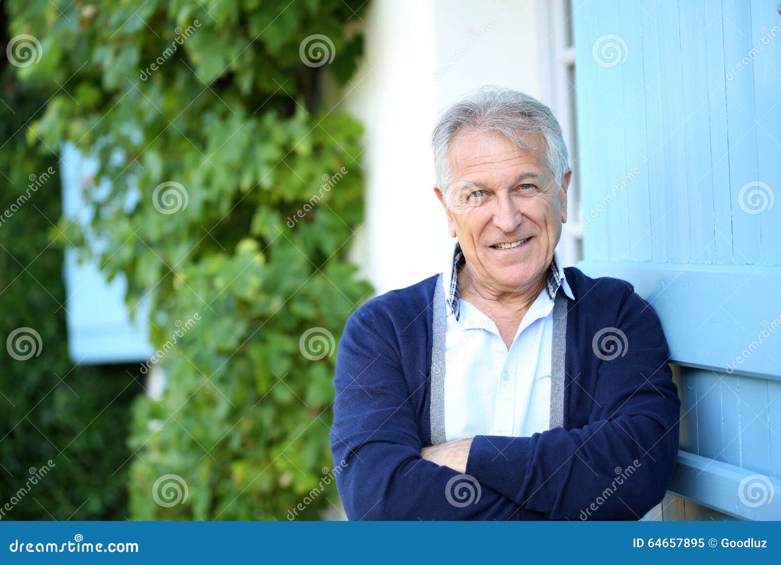 Senior Man Standing by House Wall Outdoors Stock Image - Image of ...