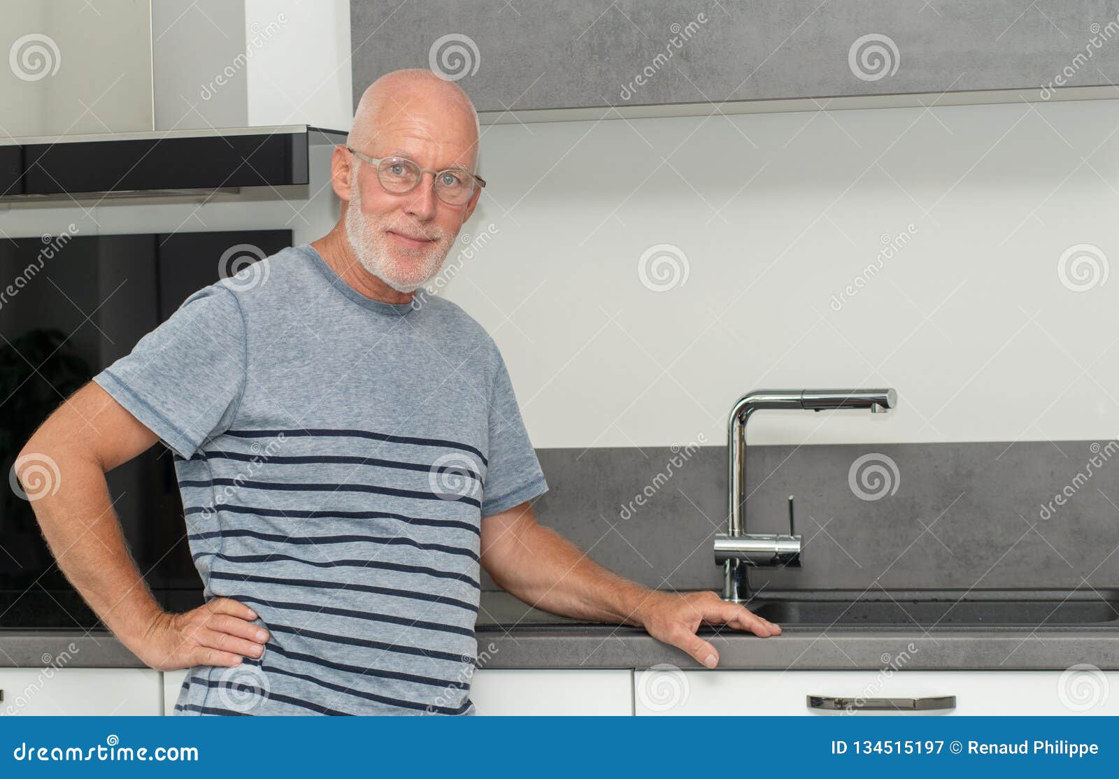Senior Man Standing in the Kitchen Stock Image - Image of standing ...