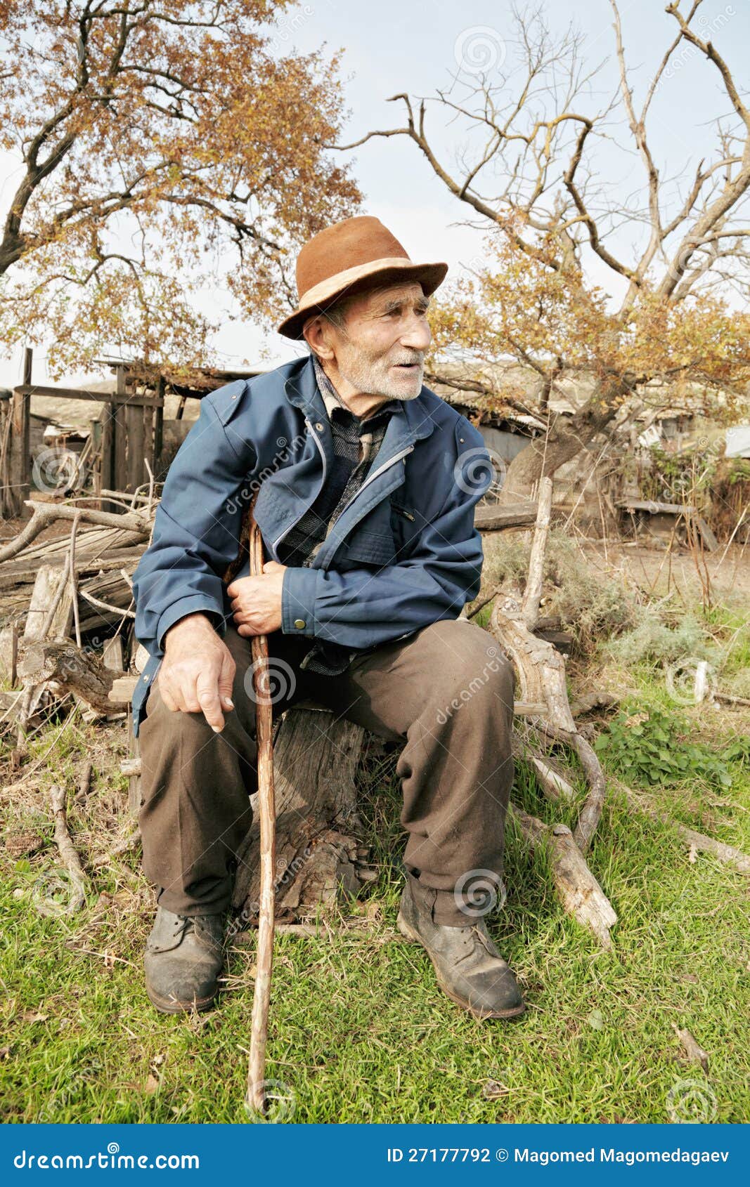 Senior man with stick stock photo. Image of portrait - 27177792