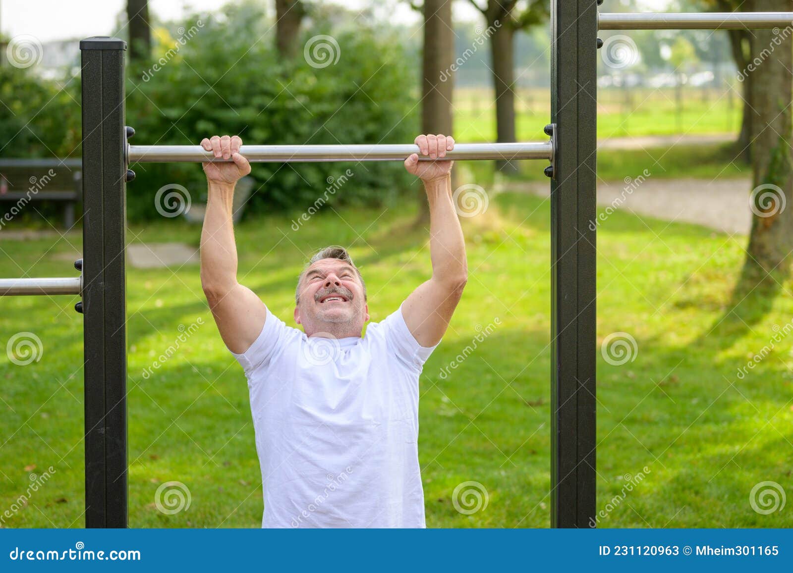 Senior Man Straining To Pull Himself Up by the Arms Stock Image - Image ...