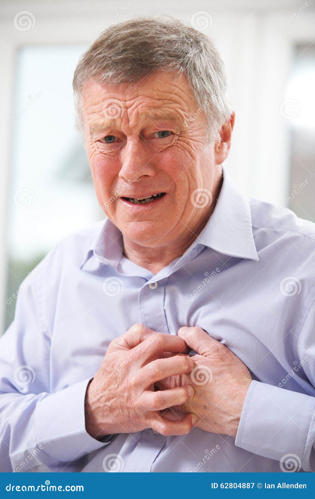 Senior Man Suffering Heart Attack at Home Stock Image - Image of people ...