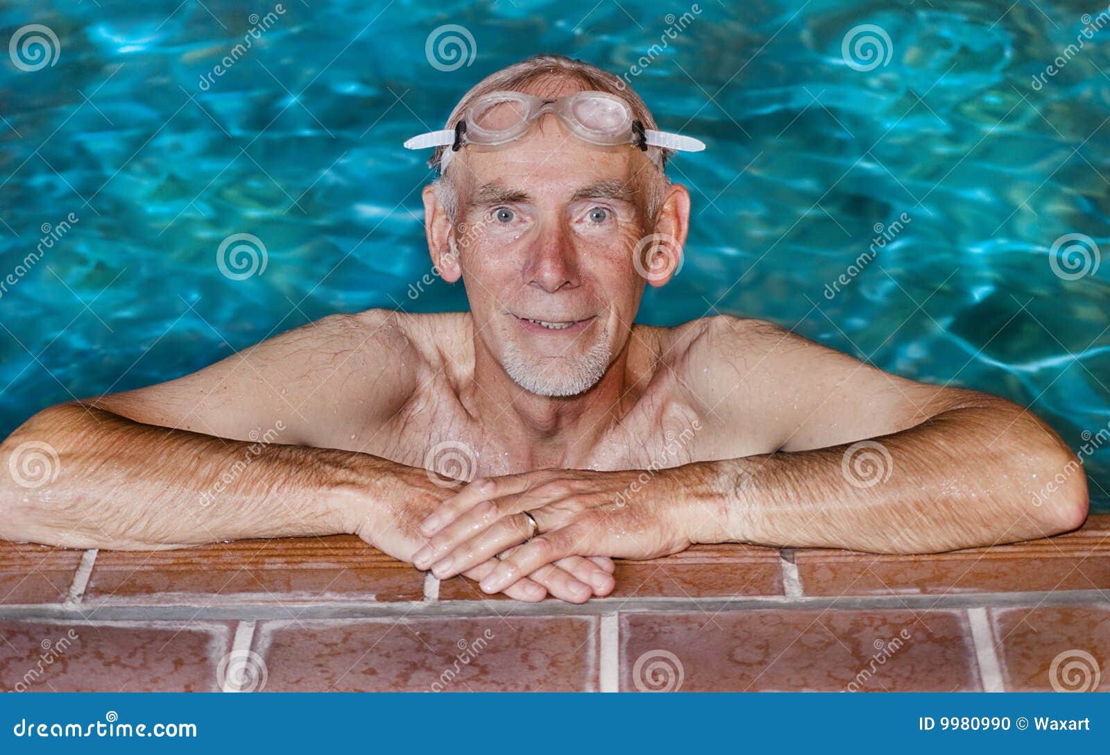 Senior Man in Swimming Pool Stock Photo - Image of smiling, senior: 9980990