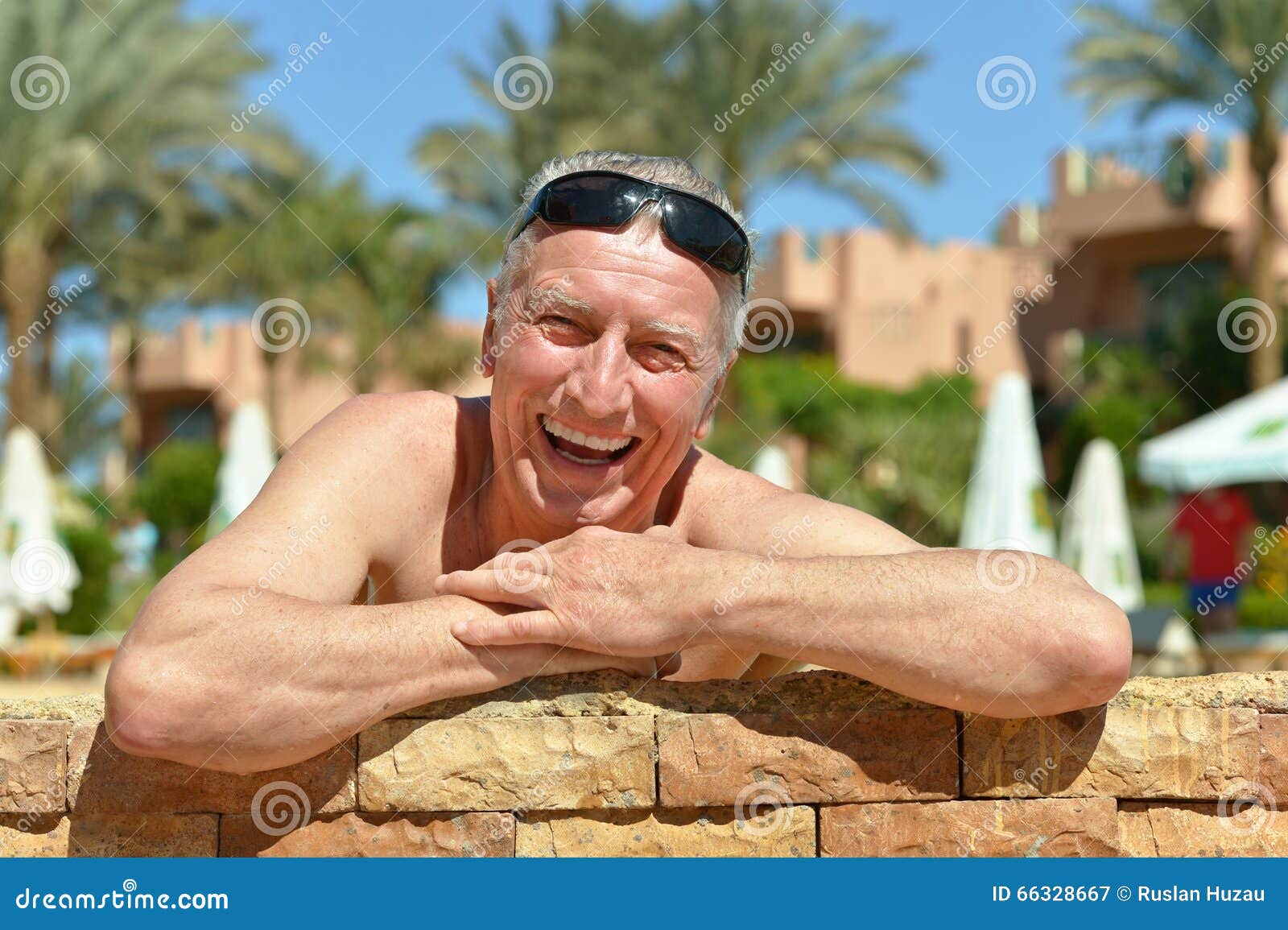 Senior Man in Swimming Pool Stock Image - Image of closeup, face: 66328667