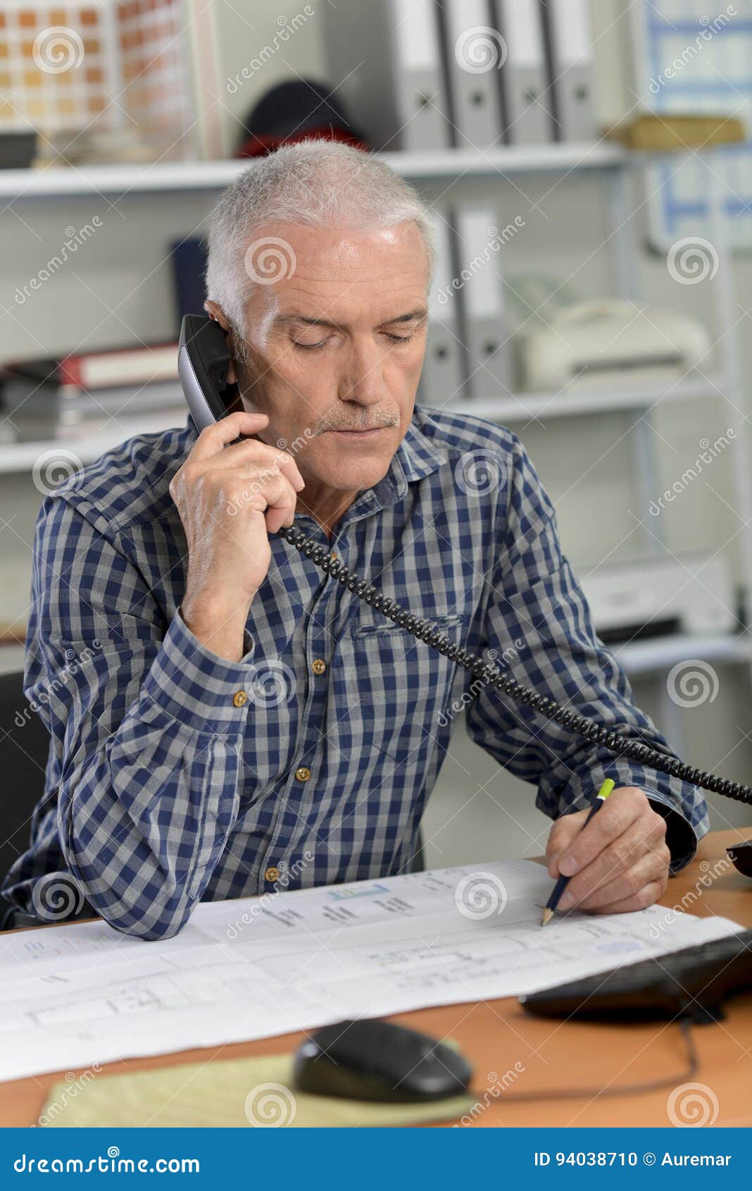 Senior Man Taking Call at Desk Stock Photo - Image of groomed ...