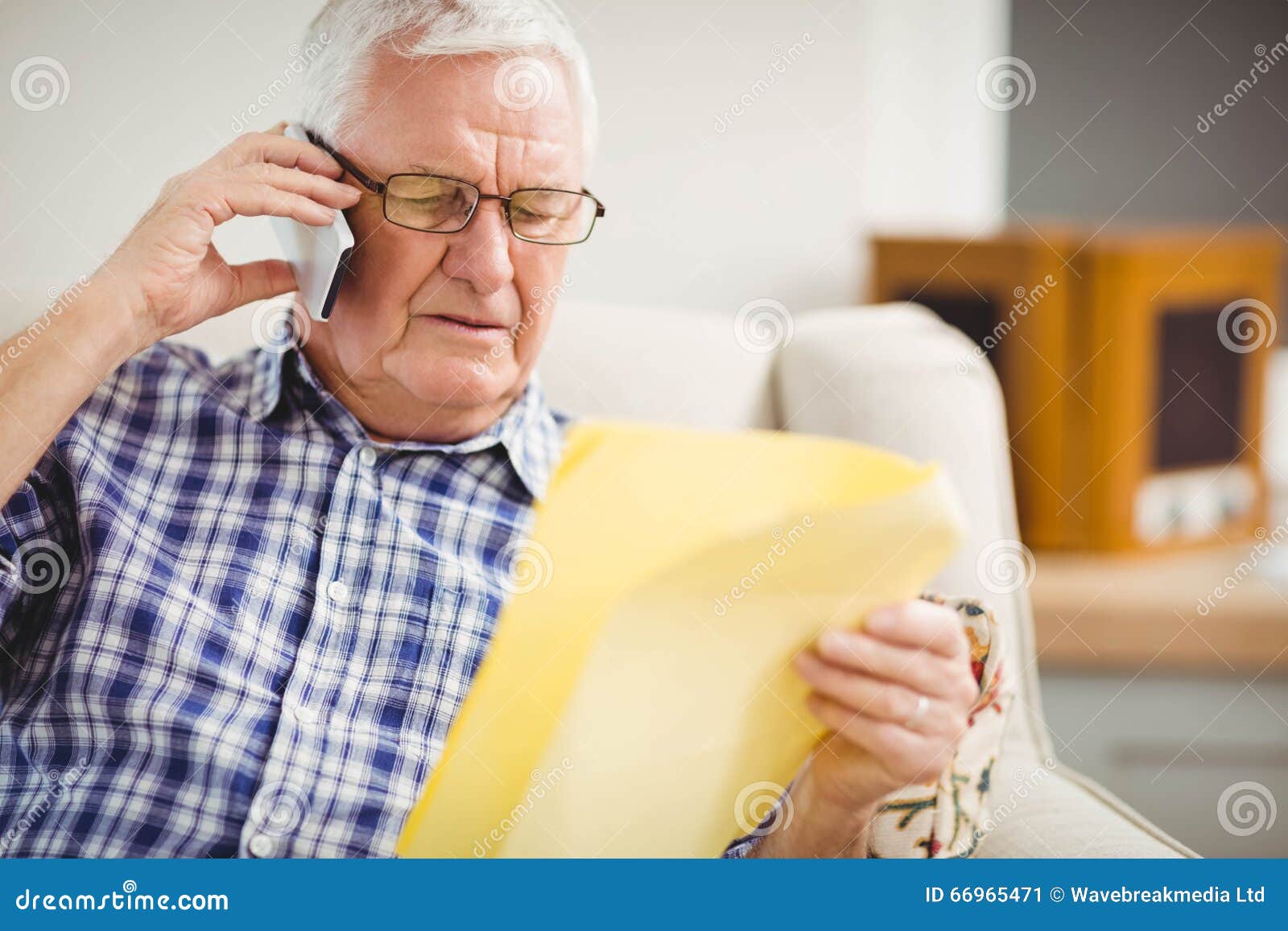 Man Spectacles Bill Sitting Sofa Stock Photos - Free & Royalty-Free ...