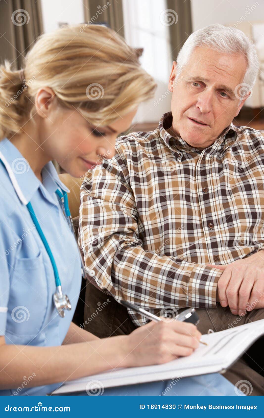 Senior Man Talking To Health Visitor Stock Photo - Image of room ...