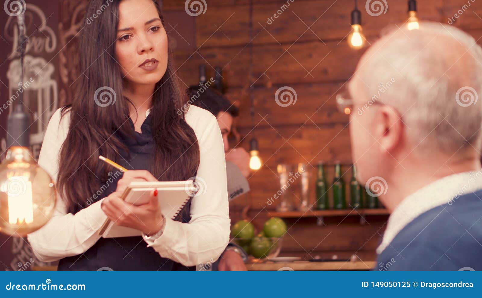 Senior Man Talking with the Waiter in a Restaurant Stock Image - Image ...