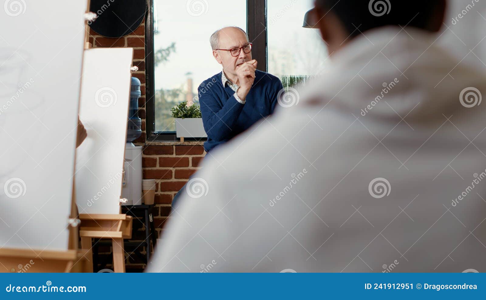 Senior Man Teaching Art Students To Draw Artwork on Canvas Stock Image ...