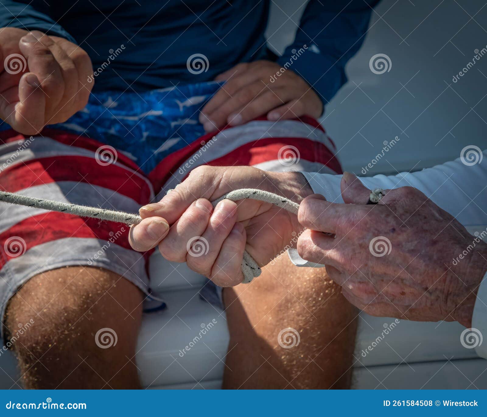 Senior Man Teaching a Young Boy How To Fish Stock Photo - Image of ...