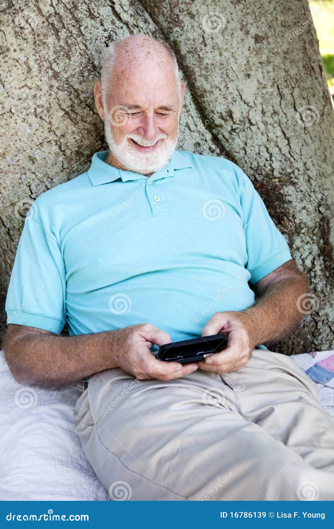 Senior Man Text Messaging stock image. Image of real - 16786139
