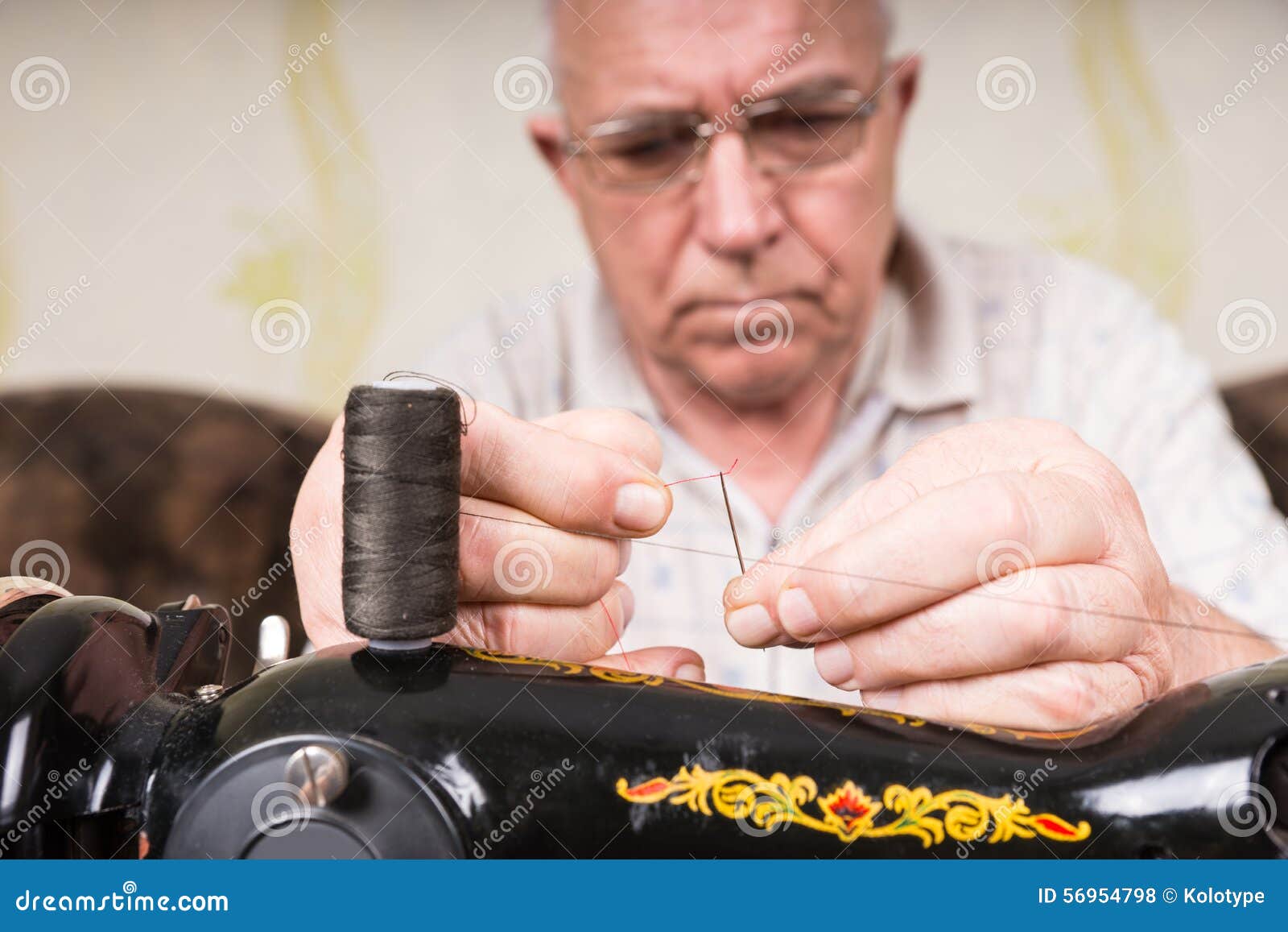 Senior Man Threading Needle of Sewing Machine Stock Photo - Image of ...