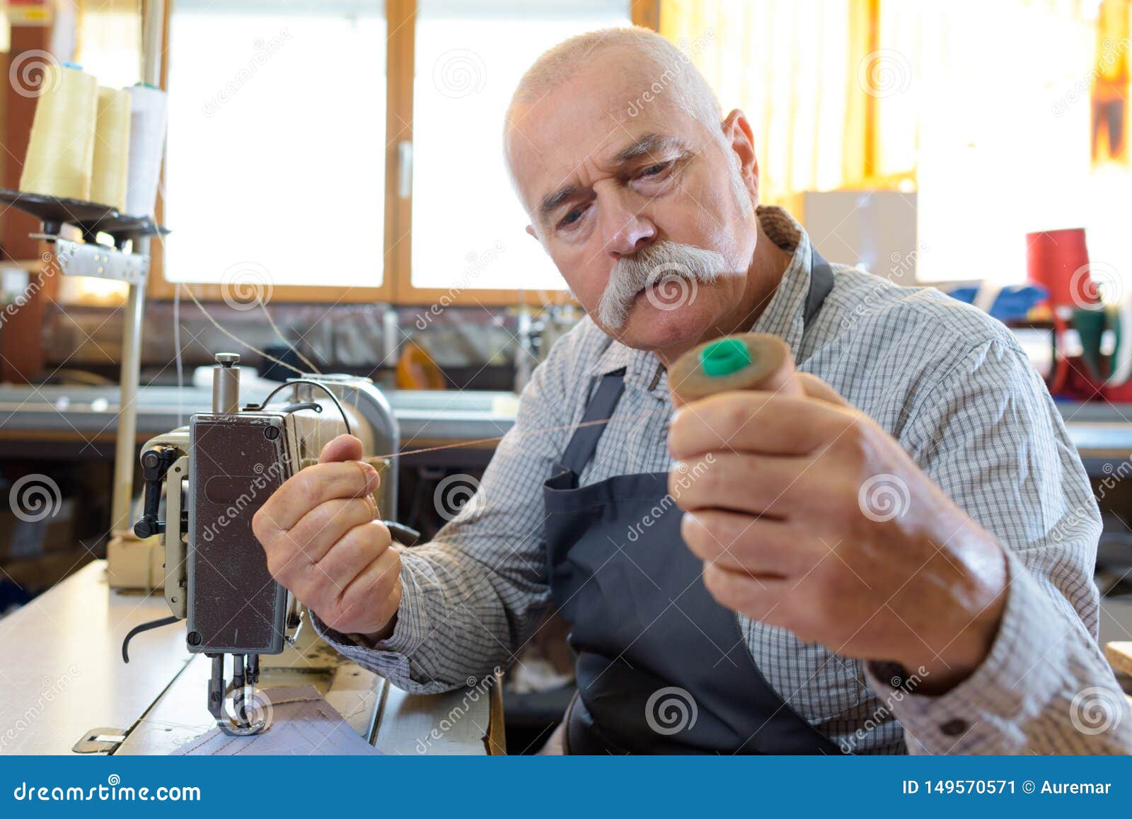 Senior Man Threading Old Fashioned Manual Sewing Machine Stock Image ...