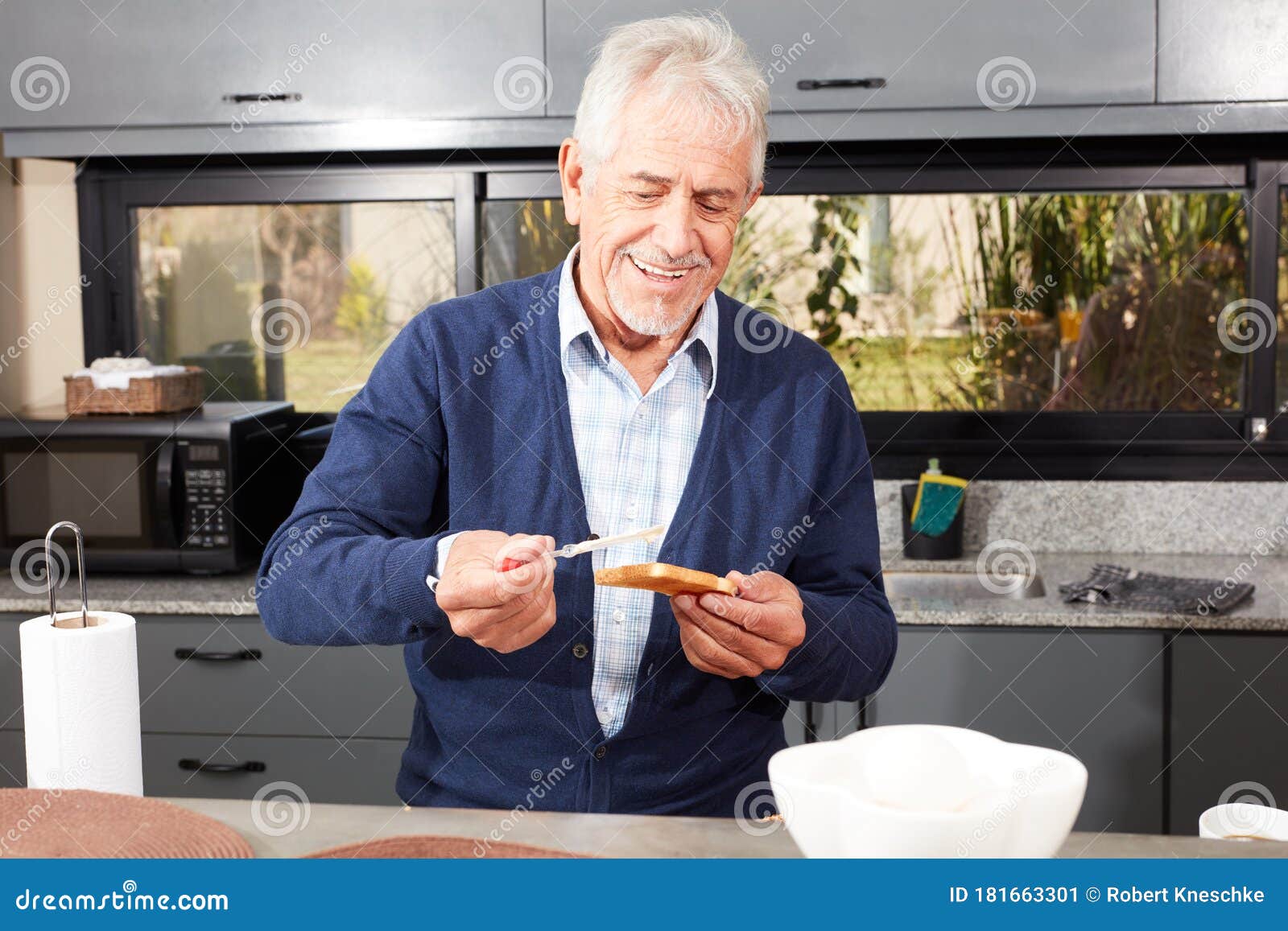 Senior Man with a Toast Bread for Breakfast Stock Image - Image of ...