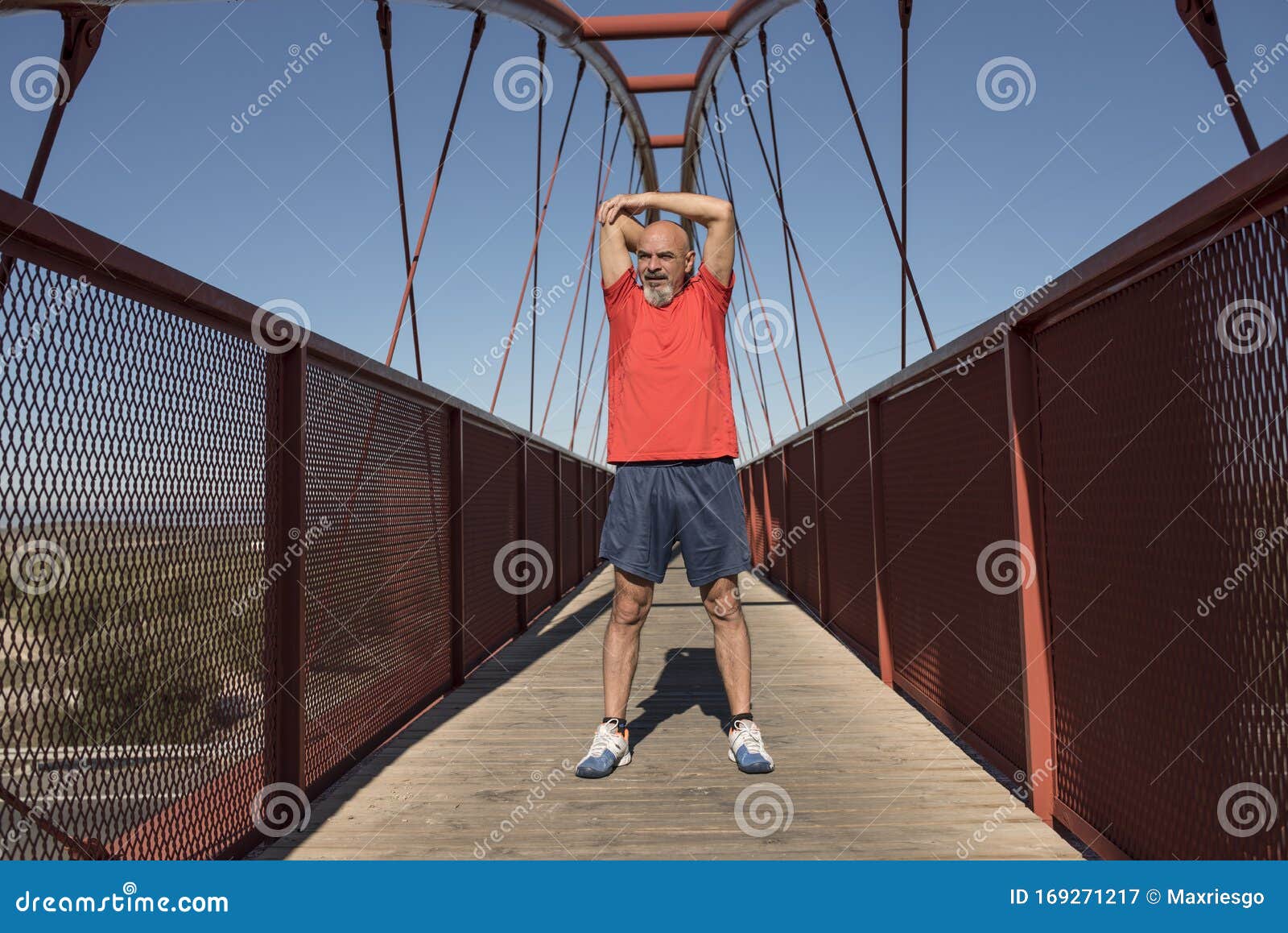 Senior Man Training and Stretching on Bridge Stock Image - Image of ...