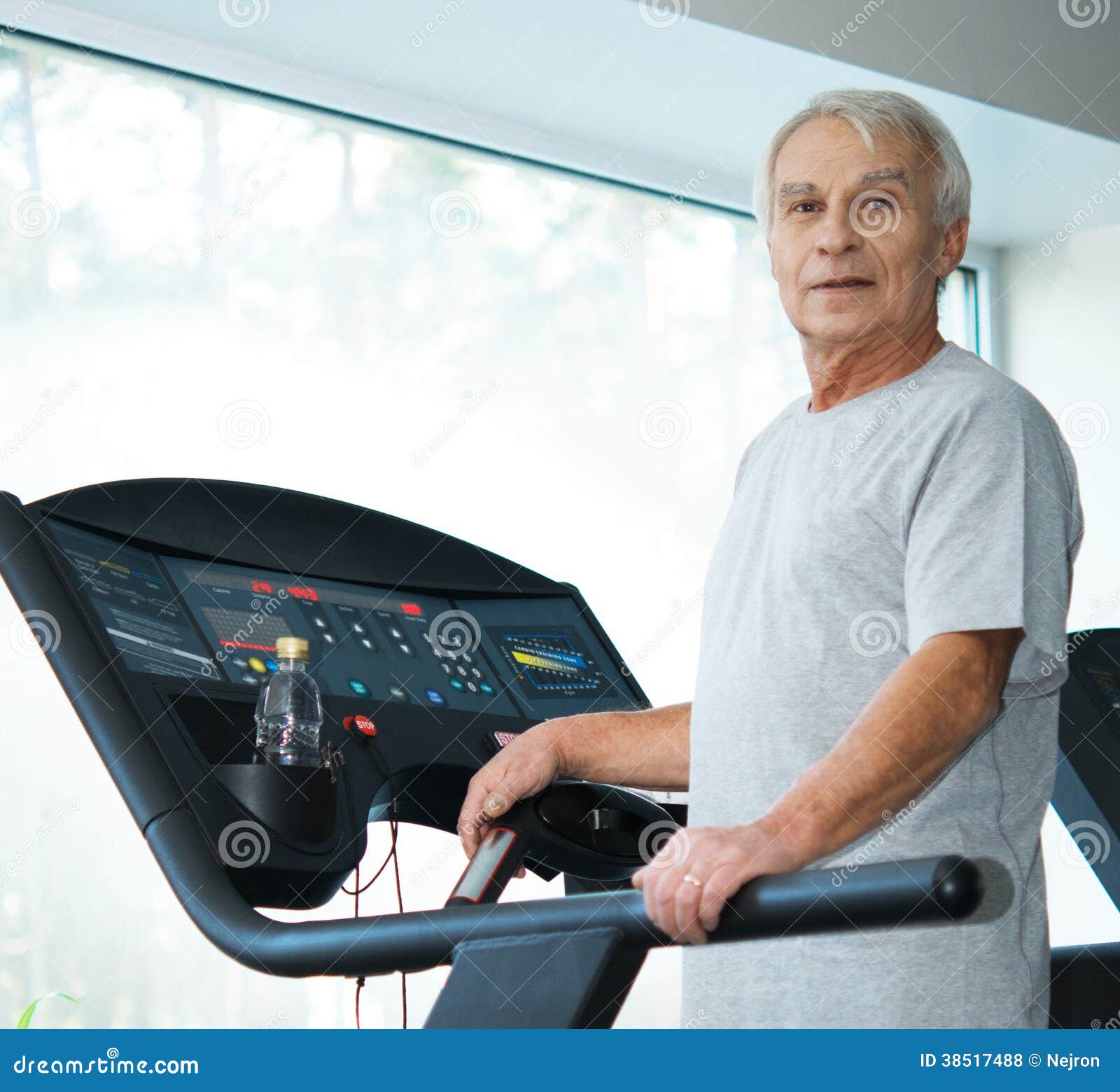 Senior man on a treadmill stock photo. Image of sportswear - 38517488