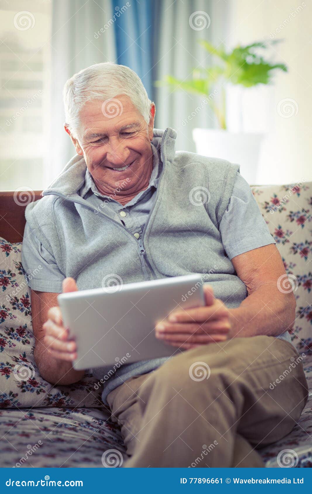 Senior Man Using Digital Tablet Stock Image - Image of grey, cheerful ... Senior Man Using Digital Tablet Stock Image - Image of grey, cheerful ...