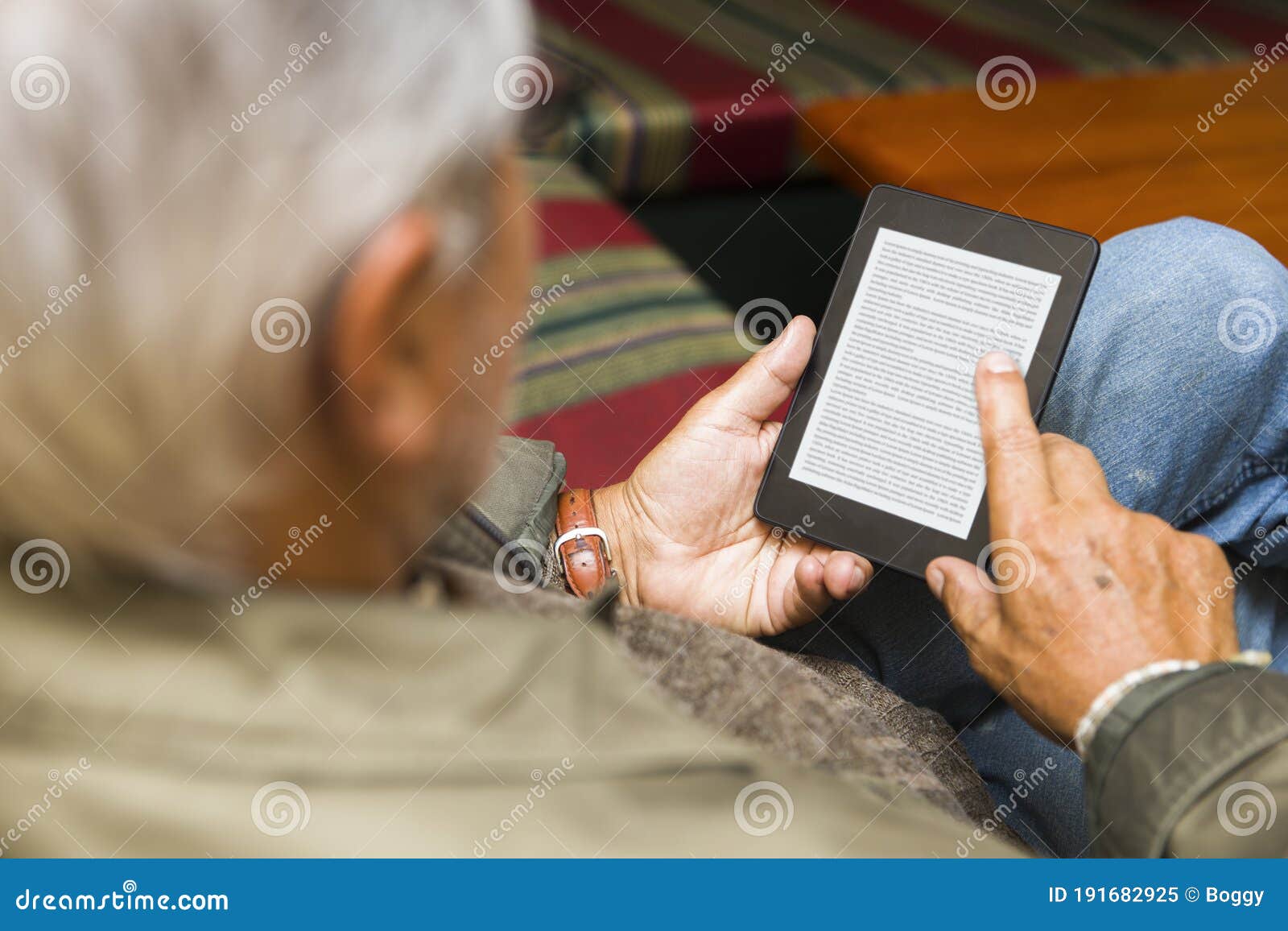 Senior Man Using an Ebook Reader Stock Image - Image of break, indoor ...