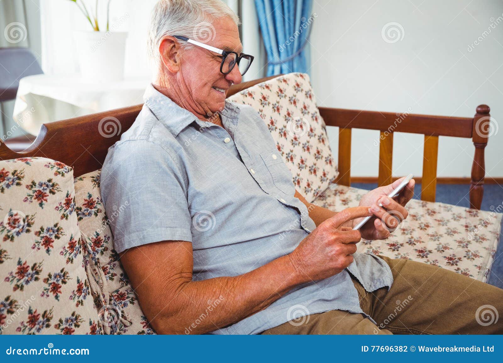 Senior Man Using a Smartphone Stock Photo - Image of hospice, lifestyle ...
