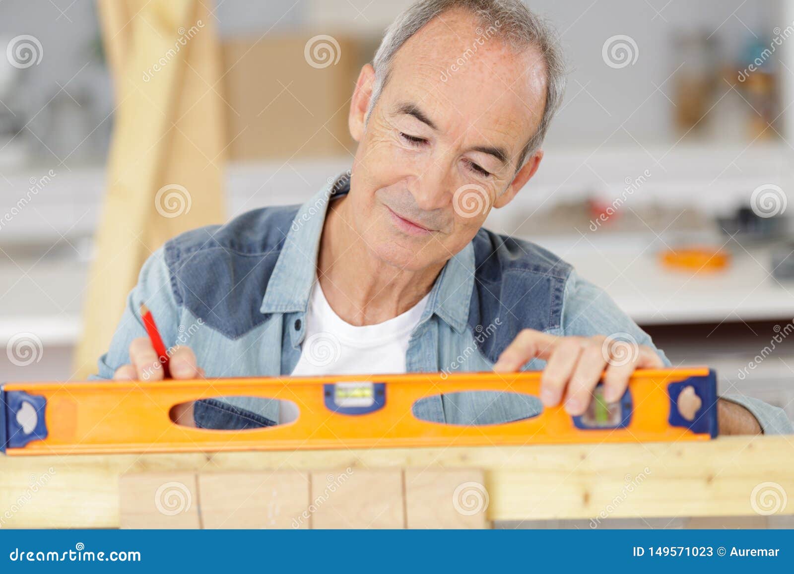 Senior Man Using Spirit Level on Piece Wood Stock Image - Image of ...