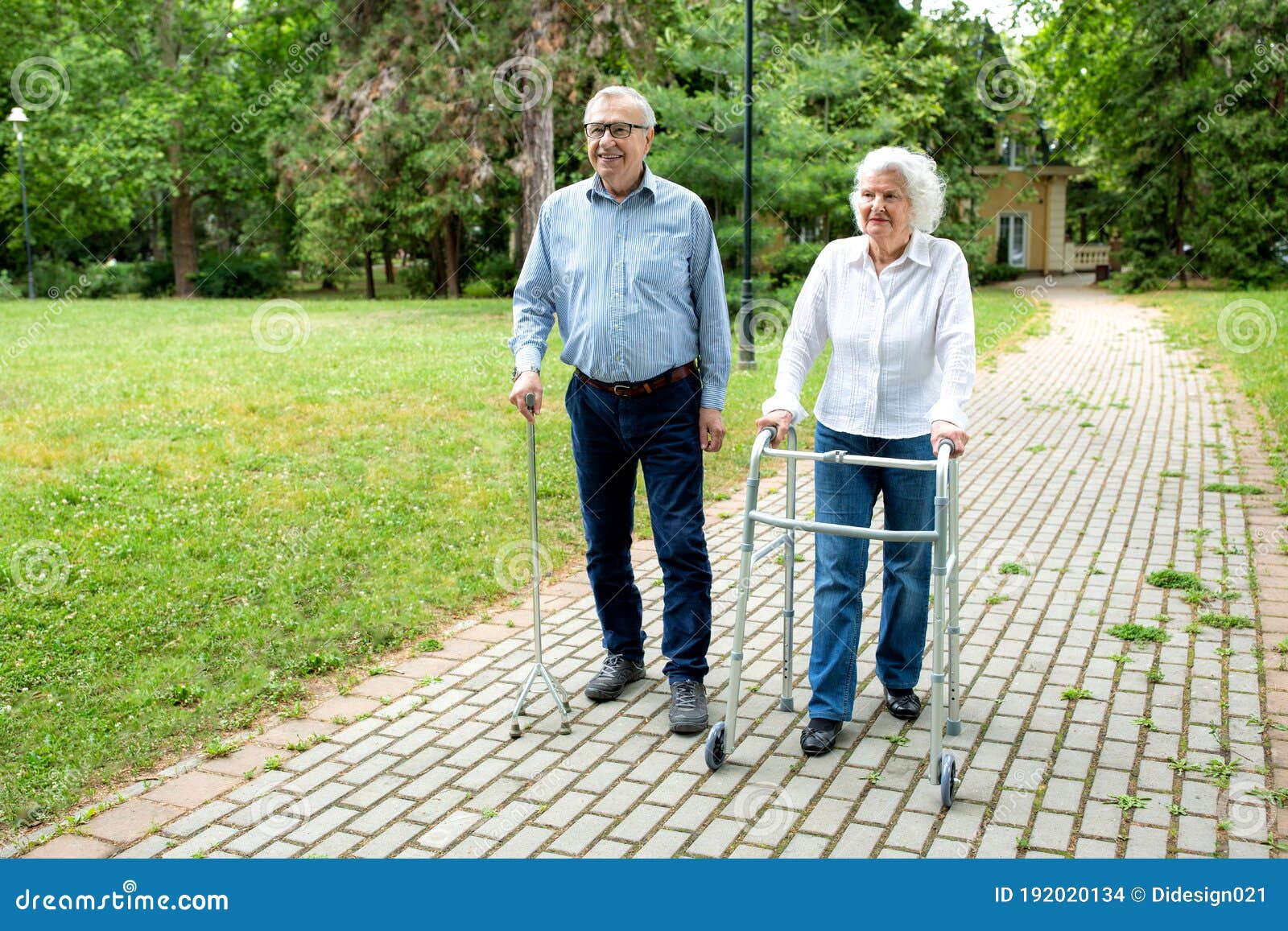 Senior Man Using a Walking Cane Accompanied by a Senior Lady Strolling ...