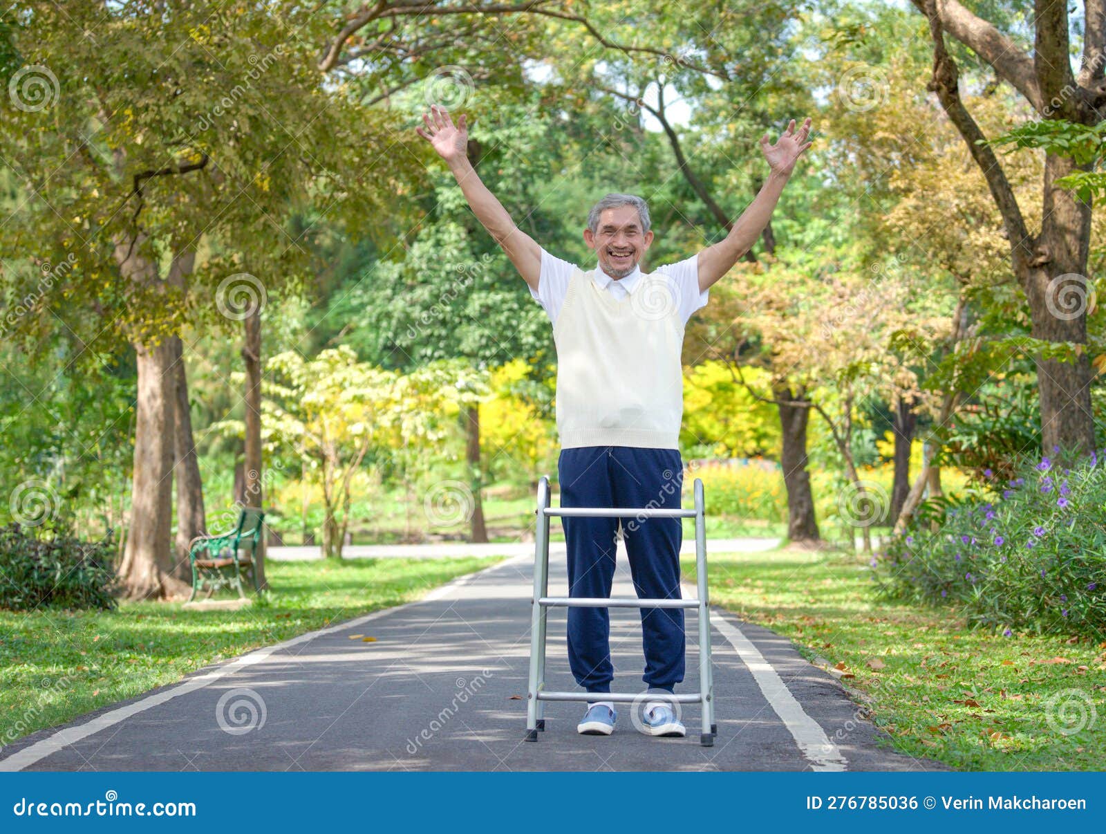 Senior Man with Walker Raising Hands Gesturing Happiness while Practice ...